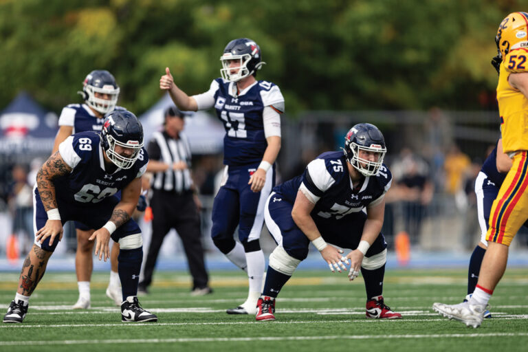 Blues football team show determination against the Queen’s Gaels – The ...